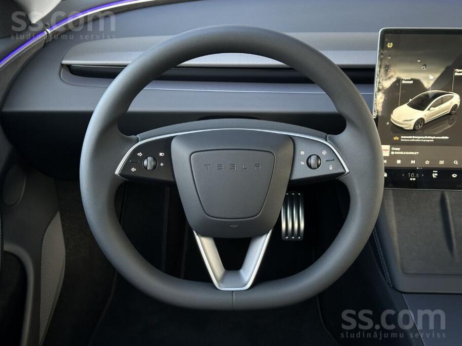 White Tesla Model 3 2025 in Riga, with an engine capacity of 0.00 L and mileage of 10 thousand km for 66720 €, photo 9 on AUTOMOTO.COM.LV