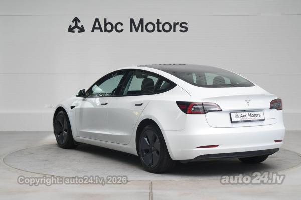 White Tesla Model 3 2022 in Tallinn, with an engine capacity of 0.00 L and mileage of 70 thousand km for 33990 €, photo 5 on AUTOMOTO.COM.LV
