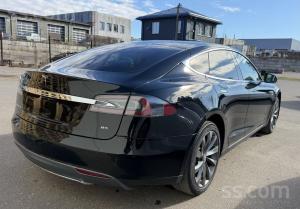 Black Tesla Model S 2013 in Riga, with an engine capacity of 0.00 L and mileage of 156 thousand km for 14777 €, photo 3 on AUTOMOTO.COM.LV
