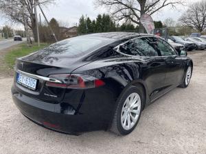 Black Tesla Model S 2020 in Riga, with an engine capacity of 0.00 L and mileage of 168 thousand km for 31490 €, photo 6 on AUTOMOTO.COM.LV
