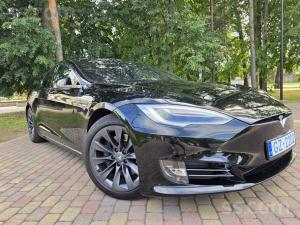 Black Tesla Model S 2020 in Riga, with an engine capacity of 0.00 L and mileage of 67 thousand km for 34034 €, photo 5 on AUTOMOTO.COM.LV