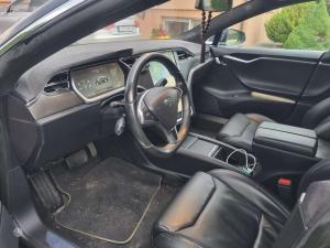 Blue Tesla Model S 2015 in Taurage, with an engine capacity of 0.00 L and mileage of 150 thousand km for 10600 €, photo 12 on AUTOMOTO.COM.LV
