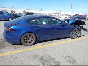 Blue Tesla Model S 2024 in Kaunas, with an engine capacity of 0.00 L and mileage of 37 thousand km for 13900 €, photo  on AUTOMOTO.COM.LV