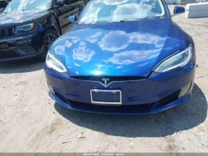 Blue Tesla Model S 2017 in Klaipeda, with an engine capacity of 0.00 L and mileage of 82 thousand km for 7700 €, photo 13 on AUTOMOTO.COM.LV
