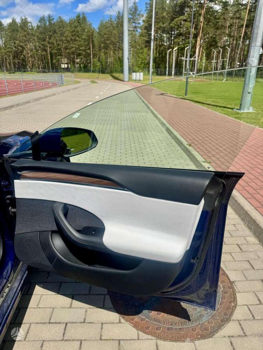 Blue Tesla Model S 2023 in Vilnius, with an engine capacity of 0.00 L and mileage of 73 thousand km for 49997 €, photo 8 on AUTOMOTO.COM.LV