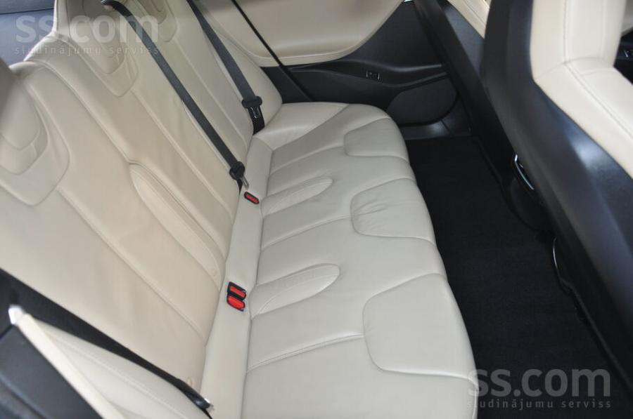 Brown Tesla Model S 2014 in Riga, with an engine capacity of 0.00 L and mileage of 177 thousand km for 15800 €, photo 3 on AUTOMOTO.COM.LV