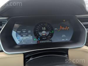 Brown Tesla Model S 2014 in Riga, with an engine capacity of 0.00 L and mileage of 177 thousand km for 15800 €, photo 14 on AUTOMOTO.COM.LV