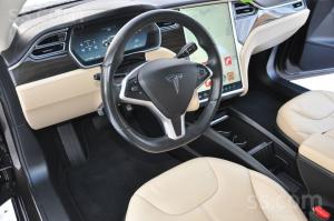 Brown Tesla Model S 2014 in Riga, with an engine capacity of 0.00 L and mileage of 177 thousand km for 15800 €, photo 16 on AUTOMOTO.COM.LV