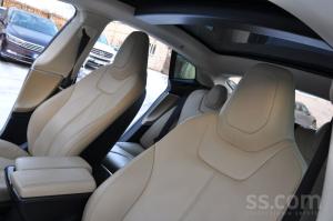 Brown Tesla Model S 2014 in Riga, with an engine capacity of 0.00 L and mileage of 177 thousand km for 15800 €, photo 18 on AUTOMOTO.COM.LV