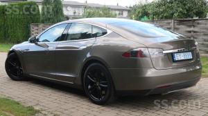 Brown Tesla Model S 2015 in Riga, with an engine capacity of 0.00 L and mileage of 196 thousand km for 14600 €, photo 4 on AUTOMOTO.COM.LV