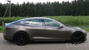 Brown Tesla Model S 2015 in Riga, with an engine capacity of 0.00 L and mileage of 196 thousand km for 14600 €, photo 7 on AUTOMOTO.COM.LV