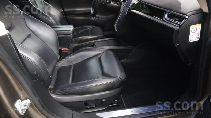 Brown Tesla Model S 2015 in Riga, with an engine capacity of 0.00 L and mileage of 196 thousand km for 14600 €, photo 15 on AUTOMOTO.COM.LV
