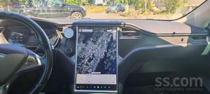 Grey Tesla Model S 2015 in Riga, with an engine capacity of 0.00 L and mileage of 304 thousand km for 17777 €, photo 10 on AUTOMOTO.COM.LV