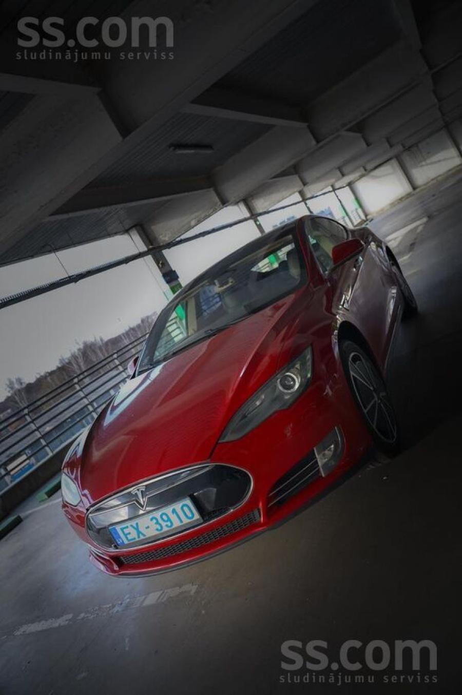 Red Tesla Model S 2014 in Riga, with an engine capacity of 0.00 L and mileage of 330 thousand km for 12890 €, photo 7 on AUTOMOTO.COM.LV