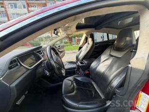 Red Tesla Model S 2014 in Riga, with an engine capacity of 0.00 L and mileage of 330 thousand km for 12890 €, photo 9 on AUTOMOTO.COM.LV
