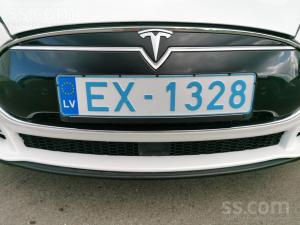 White Tesla Model S 2015 in Riga, with an engine capacity of 0.00 L and mileage of 114 thousand km for 18150 €, photo 7 on AUTOMOTO.COM.LV