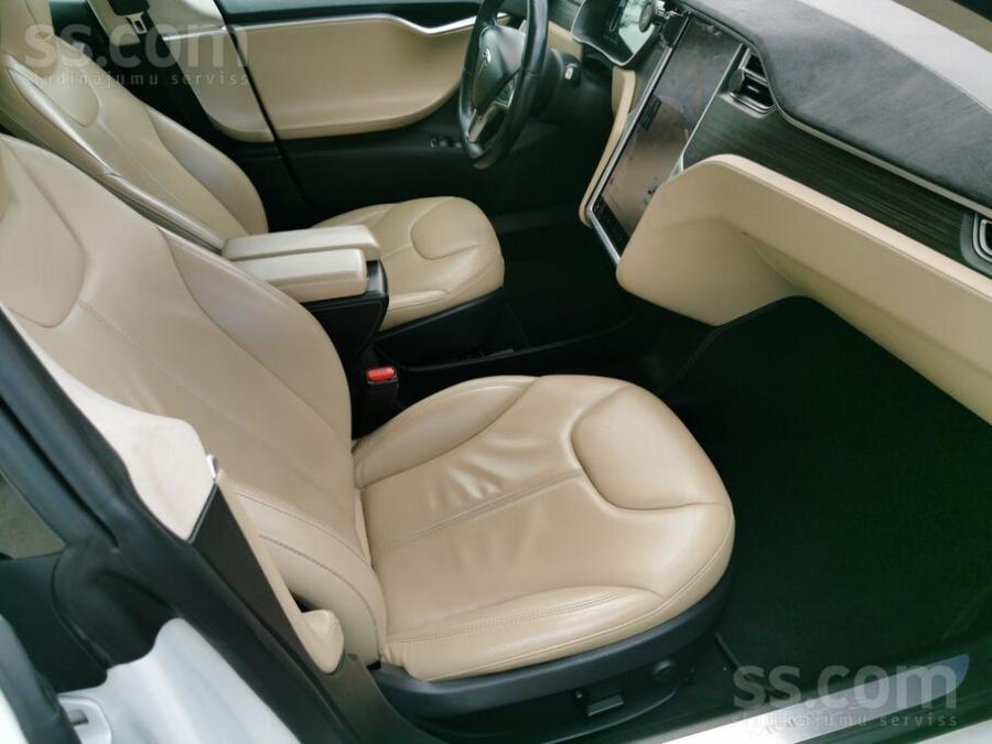 White Tesla Model S 2015 in Riga, with an engine capacity of 0.00 L and mileage of 114 thousand km for 18150 €, photo 15 on AUTOMOTO.COM.LV