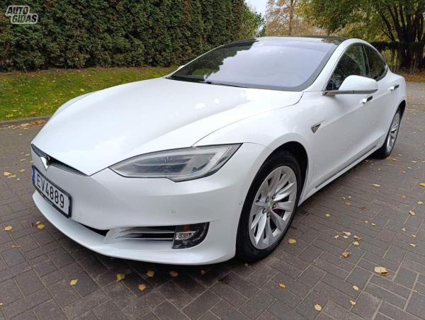 White Tesla Model S 2016 in Vilnius, with an engine capacity of 0.00 L and mileage of 32 thousand km for 25700 €, photo 1 on AUTOMOTO.COM.LV