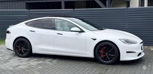 White Tesla Model S 2022 in Vilnius, with an engine capacity of 0.00 L and mileage of 112 thousand km for 37400 €, photo  on AUTOMOTO.COM.LV