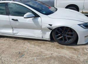 White Tesla Model S 2022 in Klaipeda, with an engine capacity of 0.00 L and mileage of 72 thousand km for 25900 €, photo 6 on AUTOMOTO.COM.LV