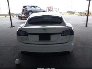 White Tesla Model S 2023 in Klaipeda, with an engine capacity of 0.00 L and mileage of 81 thousand km for 14500 €, photo 17 on AUTOMOTO.COM.LV