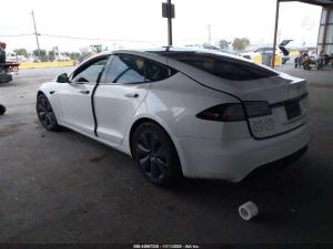 White Tesla Model S 2023 in Kaunas, with an engine capacity of 0.00 L and mileage of 80 thousand km for 29600 €, photo 5 on AUTOMOTO.COM.LV