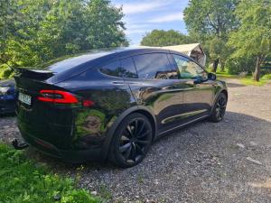 Black Tesla Model X 2018 in Riga, with an engine capacity of 0.00 L and mileage of 159 thousand km for 31000 €, photo 7 on AUTOMOTO.COM.LV
