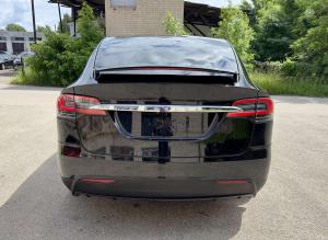 Black Tesla Model X 2019 in Prienai, with an engine capacity of 0.00 L and mileage of 99 thousand km for 29750 €, photo 7 on AUTOMOTO.COM.LV