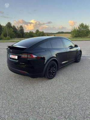 Melns Tesla Model X 2020 Viļņa, ar dzinēja tilpumu 0.00 L un nobraukumu 56 tūkst. km par 35400 €, foto 9 vietnē AUTOMOTO.COM.LV