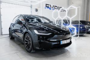 Black Tesla Model X 2023 in Riga, with an engine capacity of 0.00 L and mileage of 36 thousand km for 71990 €, photo  on AUTOMOTO.COM.LV
