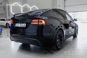 Black Tesla Model X 2023 in Riga, with an engine capacity of 0.00 L and mileage of 36 thousand km for 71990 €, photo 8 on AUTOMOTO.COM.LV