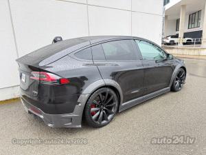 Black Tesla Model X 2016 in Tallinn, with an engine capacity of 0.00 L and mileage of 126 thousand km for 24999 €, photo 4 on AUTOMOTO.COM.LV