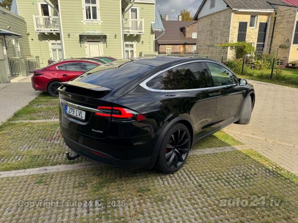 Black Tesla Model X 2020 in Tallinn, with an engine capacity of 0.00 L and mileage of 83 thousand km for 47900 €, photo 4 on AUTOMOTO.COM.LV