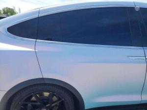 Blue Tesla Model X 2017 in Klaipeda, with an engine capacity of 0.00 L and mileage of 110 thousand km for 9800 €, photo 4 on AUTOMOTO.COM.LV