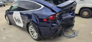 Blue Tesla Model X 2017 in Siauliai, with an engine capacity of 0.00 L and mileage of 151 thousand km for 10990 €, photo 5 on AUTOMOTO.COM.LV