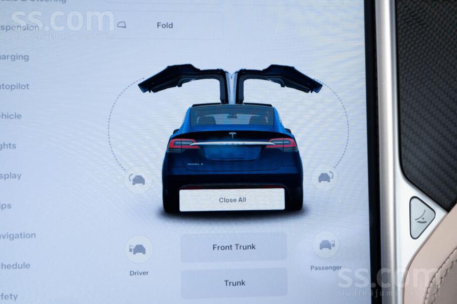 Blue Tesla Model X 2018 in Riga, with an engine capacity of 0.00 L and mileage of 136 thousand km for 33990 €, photo 27 on AUTOMOTO.COM.LV