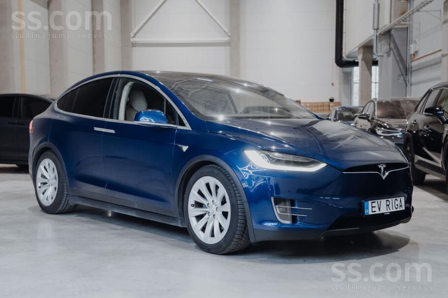 Blue Tesla Model X 2018 in Riga, with an engine capacity of 0.00 L and mileage of 136 thousand km for 30900 €, photo 1 on AUTOMOTO.COM.LV