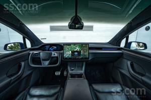 Blue Tesla Model X 2022 in Riga, with an engine capacity of 0.00 L and mileage of 70 thousand km for 40000 €, photo 12 on AUTOMOTO.COM.LV
