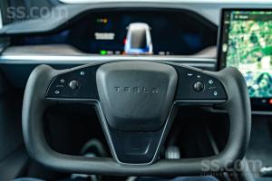 Blue Tesla Model X 2022 in Riga, with an engine capacity of 0.00 L and mileage of 70 thousand km for 40000 €, photo 13 on AUTOMOTO.COM.LV