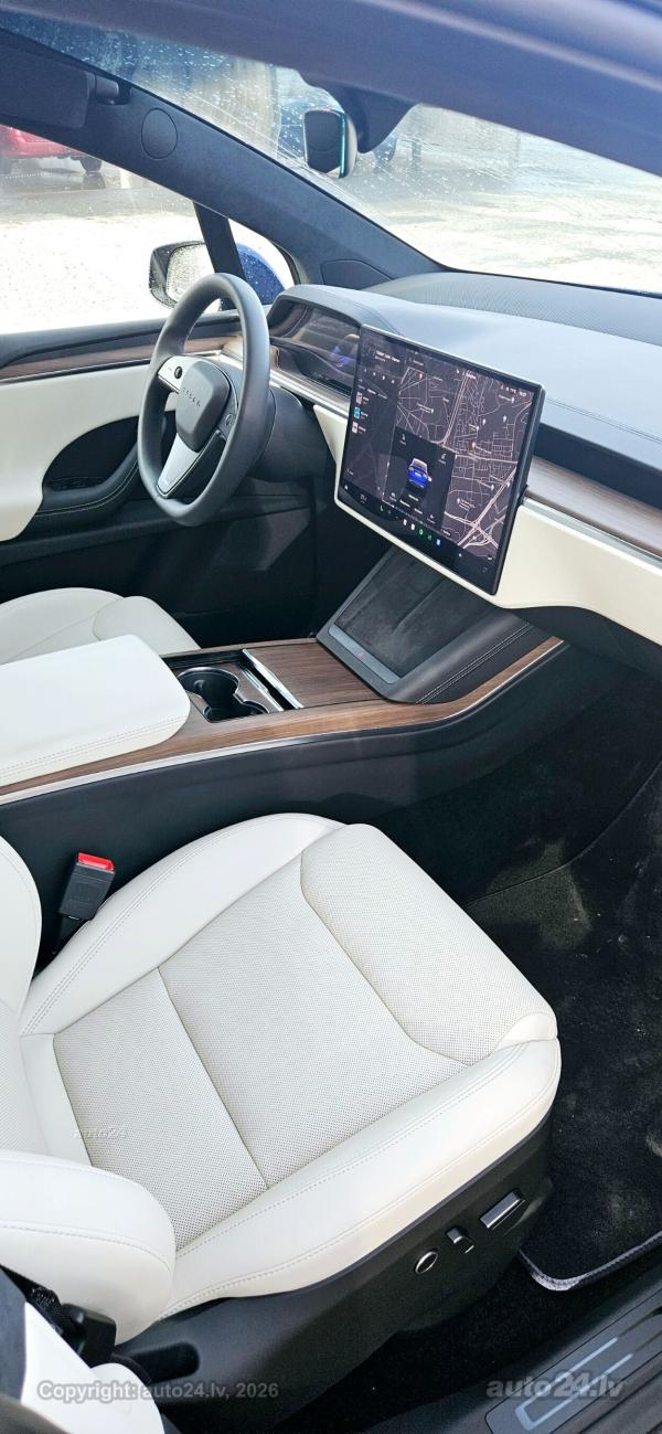 Blue Tesla Model X 2023 in Tallinn, with an engine capacity of 0.00 L and mileage of 8 thousand km for 84900 €, photo 3 on AUTOMOTO.COM.LV