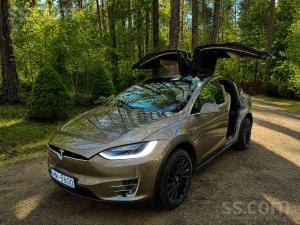 Brūns Tesla Model X 2016 Rīga, ar dzinēja tilpumu 0.00 L un nobraukumu 182 tūkst. km par 27590 €, foto 4 vietnē AUTOMOTO.COM.LV