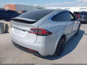 Grey Tesla Model X 2016 in Klaipeda, with an engine capacity of 0.00 L and mileage of 0 thousand km for 8100 €, photo 9 on AUTOMOTO.COM.LV
