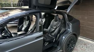 Grey Tesla Model X 2017 in Riga, with an engine capacity of 0.00 L and mileage of 190 thousand km for 31900 €, photo 6 on AUTOMOTO.COM.LV