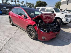 Red Tesla Model X 2016 in Kaunas, with an engine capacity of 0.00 L and mileage of 161 thousand km for 9999 €, photo 11 on AUTOMOTO.COM.LV