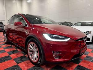 Red Tesla Model X 2016 in Vilnius, with an engine capacity of 0.00 L and mileage of 106 thousand km for 19890 €, photo 4 on AUTOMOTO.COM.LV
