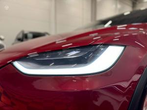Red Tesla Model X 2016 in Vilnius, with an engine capacity of 0.00 L and mileage of 106 thousand km for 19890 €, photo 9 on AUTOMOTO.COM.LV
