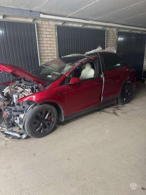 Red Tesla Model X 2023 in Kaunas, with an engine capacity of 0.00 L and mileage of 65 thousand km for 25000 €, photo  on AUTOMOTO.COM.LV
