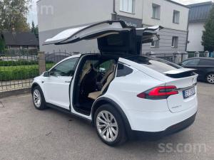White Tesla Model X 2016 in Riga, with an engine capacity of 0.00 L and mileage of 122 thousand km for 28400 €, photo  on AUTOMOTO.COM.LV