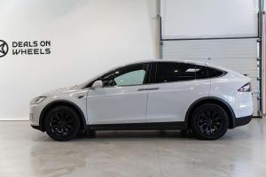 White Tesla Model X 2018 in Vilnius, with an engine capacity of 0.00 L and mileage of 112 thousand km for 24900 €, photo 5 on AUTOMOTO.COM.LV