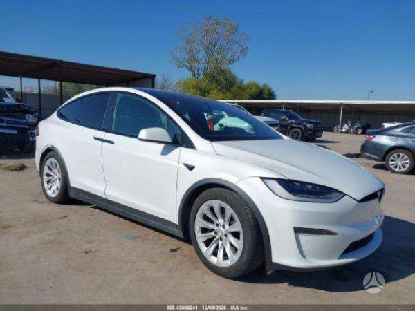 White Tesla Model X 2022 in Klaipeda, with an engine capacity of 0.00 L and mileage of 150 thousand km for 17700 €, photo 1 on AUTOMOTO.COM.LV
